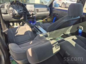 Black BMW 316 1994 in Riga, with an engine capacity of 2.50 L and mileage of 318 thousand km for 9800 €, photo 7 on AUTOMOTO.COM.LV