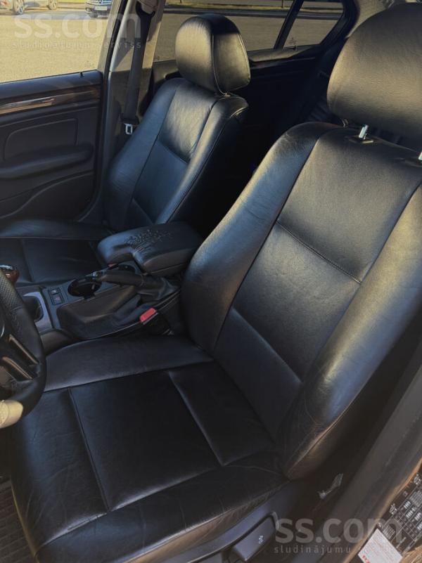 Black BMW 316 2005 in Riga, with an engine capacity of 1.80 L and mileage of 277 thousand km for 1700 €, photo 7 on AUTOMOTO.COM.LV