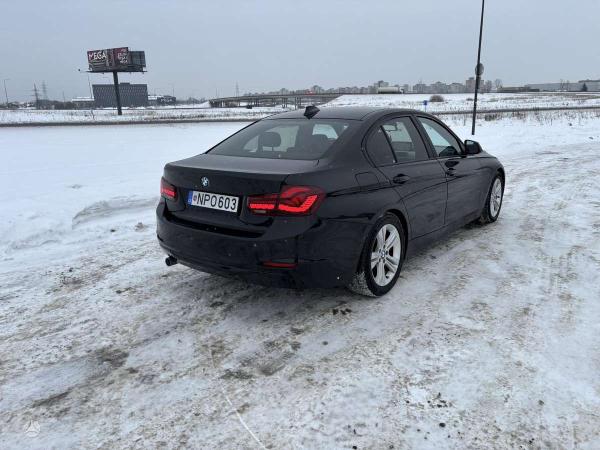 Black BMW 316 2012 in Kaunas, with an engine capacity of 2.00 L and mileage of 326 thousand km for 8900 €, photo 5 on AUTOMOTO.COM.LV