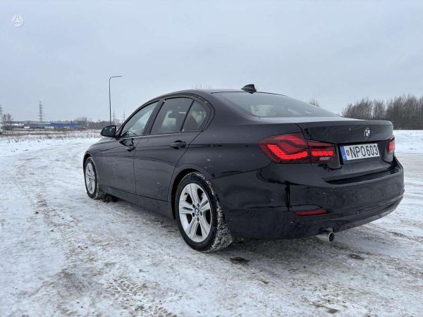 Black BMW 316 2012 in Kaunas, with an engine capacity of 2.00 L and mileage of 326 thousand km for 8900 €, photo 7 on AUTOMOTO.COM.LV