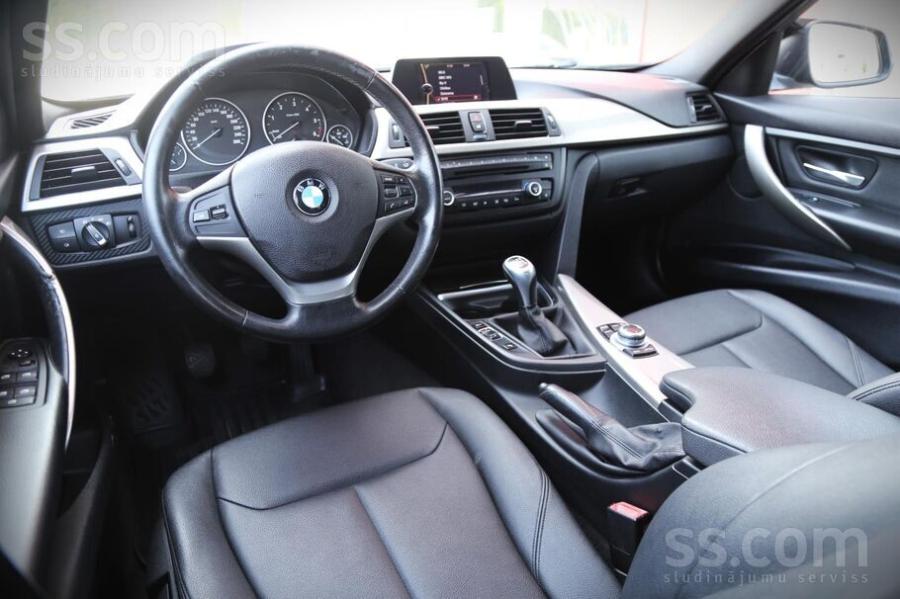 Black BMW 316 2012 in Riga, with an engine capacity of 2.00 L and mileage of 230 thousand km for 6995 €, photo 8 on AUTOMOTO.COM.LV