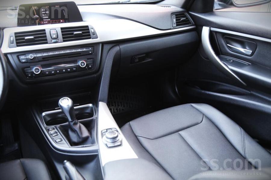 Black BMW 316 2012 in Riga, with an engine capacity of 2.00 L and mileage of 230 thousand km for 6995 €, photo 9 on AUTOMOTO.COM.LV