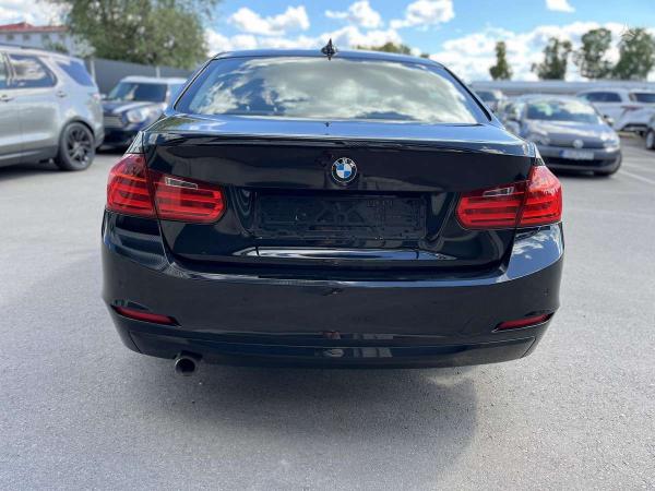 Black BMW 316 2013 in Siauliai, with an engine capacity of 2.00 L and mileage of 240 thousand km for 5900 €, photo 4 on AUTOMOTO.COM.LV
