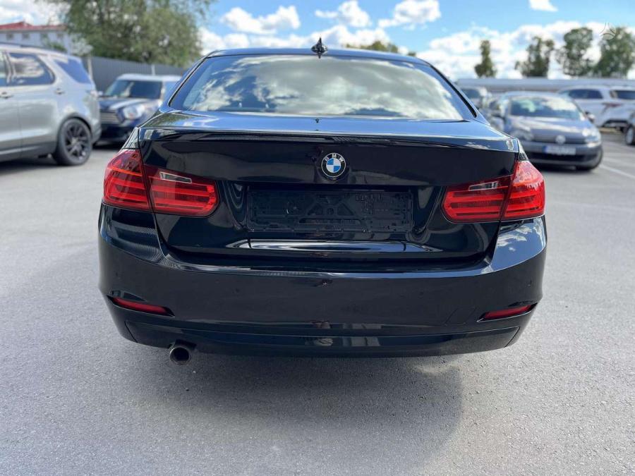 Black BMW 316 2013 in Siauliai, with an engine capacity of 2.00 L and mileage of 240 thousand km for 5900 €, photo 5 on AUTOMOTO.COM.LV