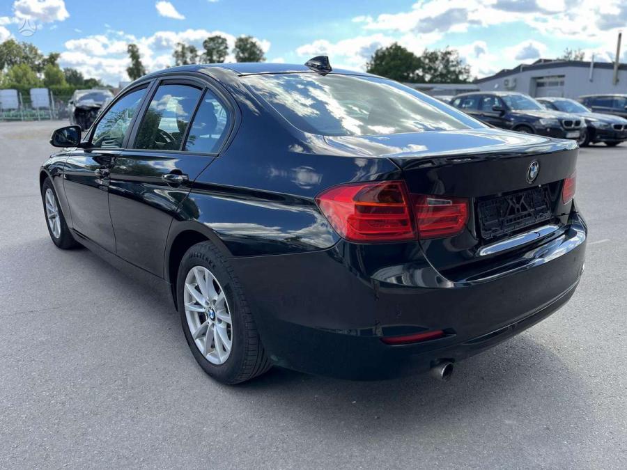 Black BMW 316 2013 in Siauliai, with an engine capacity of 2.00 L and mileage of 240 thousand km for 5900 €, photo 6 on AUTOMOTO.COM.LV