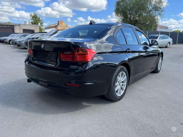 Black BMW 316 2013 in Siauliai, with an engine capacity of 2.00 L and mileage of 240 thousand km for 5900 €, photo 6 on AUTOMOTO.COM.LV