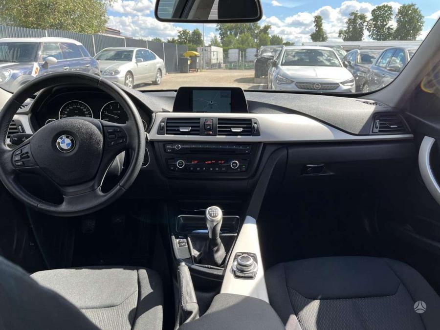 Black BMW 316 2013 in Siauliai, with an engine capacity of 2.00 L and mileage of 240 thousand km for 5900 €, photo 12 on AUTOMOTO.COM.LV