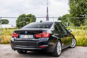 Black BMW 316 2013 in Riga, with an engine capacity of 2.00 L and mileage of 355 thousand km for 8590 €, photo 8 on AUTOMOTO.COM.LV