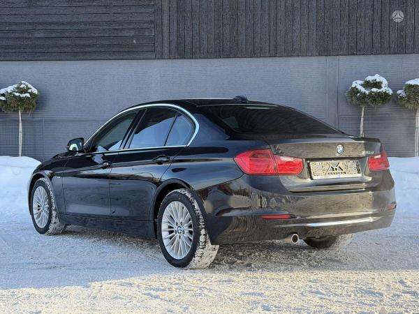 Black BMW 316 2015 in Siauliai, with an engine capacity of 2.00 L and mileage of 214 thousand km for 10550 €, photo 5 on AUTOMOTO.COM.LV