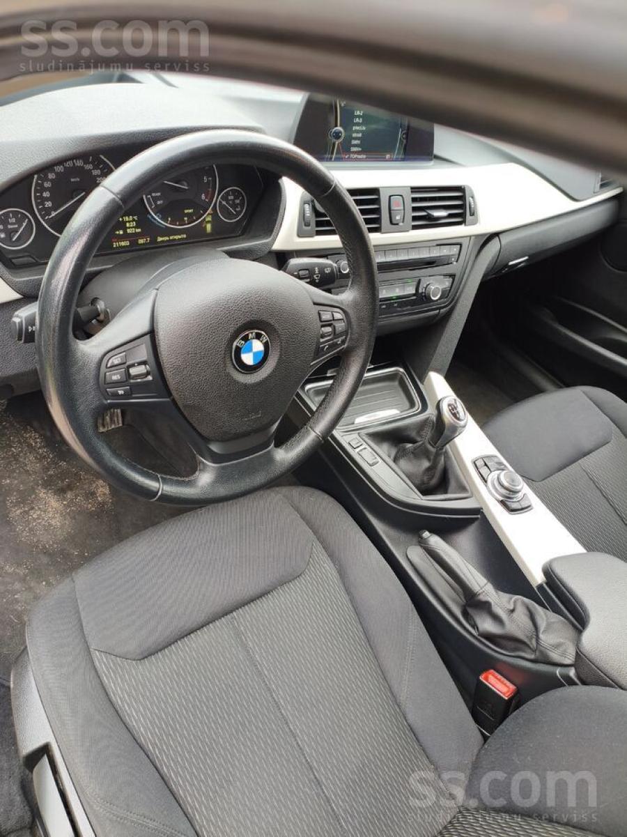 Black BMW 316 2013 in Dobele, with an engine capacity of 2.00 L and mileage of 210 thousand km for 7150 €, photo 7 on AUTOMOTO.COM.LV