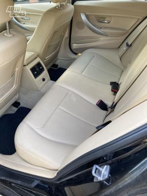Black BMW 316 2013 in Vilnius, with an engine capacity of 2.00 L and mileage of 297 thousand km for 5800 €, photo 8 on AUTOMOTO.COM.LV