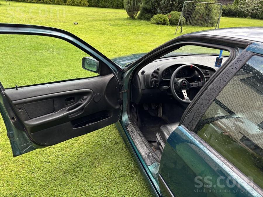 Green BMW 316 1996 in Talsi, with an engine capacity of 2.00 L and mileage of 191 thousand km for 3050 €, photo 8 on AUTOMOTO.COM.LV
