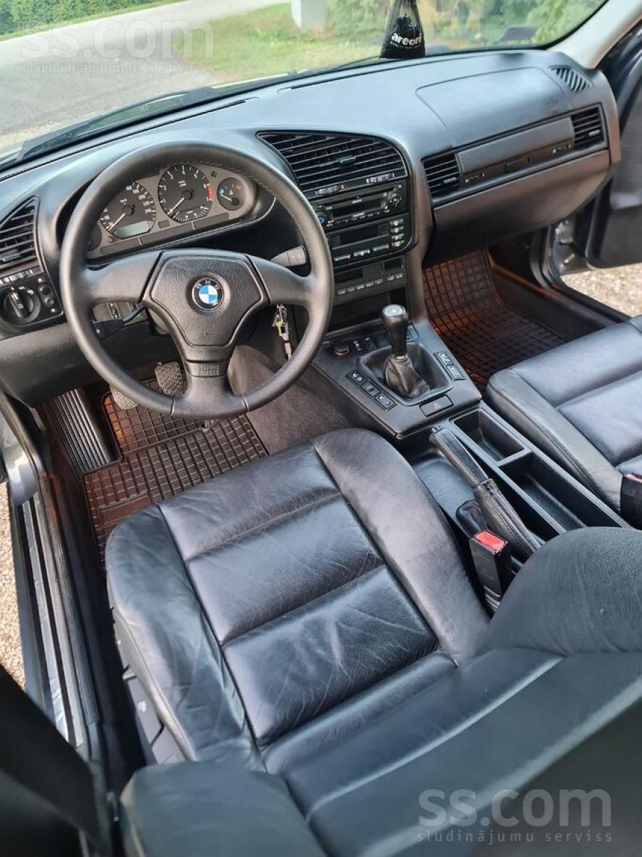 Grey BMW 316 1998 in Riga, with an engine capacity of 1.60 L and mileage of 312 thousand km for 4990 €, photo 9 on AUTOMOTO.COM.LV