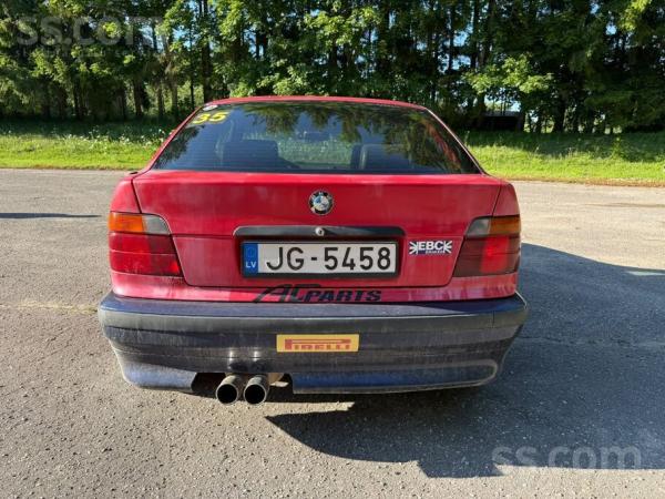 Red BMW 316 1994 in Talsi, with an engine capacity of 1.80 L and mileage of 390 thousand km for 2399 €, photo 3 on AUTOMOTO.COM.LV