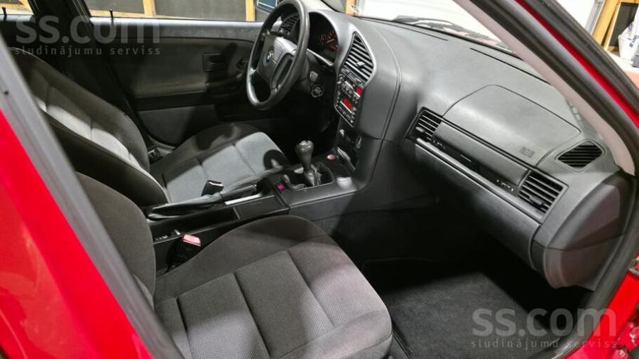 Red BMW 316 1996 in Riga, with an engine capacity of 1.60 L and mileage of 123 thousand km for 6250 €, photo 7 on AUTOMOTO.COM.LV