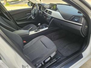 White BMW 316 2013 in Siauliai, with an engine capacity of 2.00 L and mileage of 176 thousand km for 6750 €, photo 15 on AUTOMOTO.COM.LV