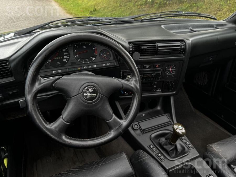 Black BMW 318 1993 in Liepaja, with an engine capacity of 1.80 L and mileage of 246 thousand km for 8490 €, photo 11 on AUTOMOTO.COM.LV
