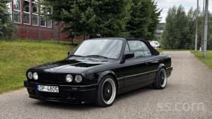 Black BMW 318 1993 in Liepaja, with an engine capacity of 1.80 L and mileage of 246 thousand km for 8490 €, photo 14 on AUTOMOTO.COM.LV