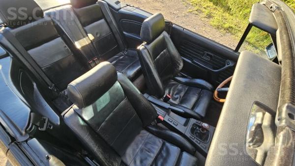 Black BMW 318 1993 in Riga, with an engine capacity of 1.80 L and mileage of 263 thousand km for 10600 €, photo 8 on AUTOMOTO.COM.LV