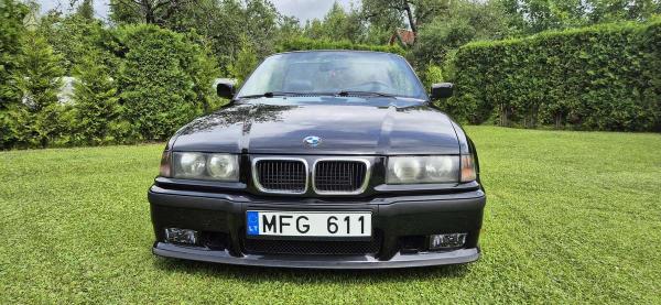 Black BMW 318 1998 in Kaunas, with an engine capacity of 1.80 L and mileage of 215 thousand km for 5800 €, photo 8 on AUTOMOTO.COM.LV