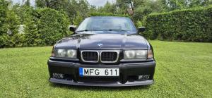 Black BMW 318 1998 in Kaunas, with an engine capacity of 1.80 L and mileage of 215 thousand km for 5800 €, photo 9 on AUTOMOTO.COM.LV
