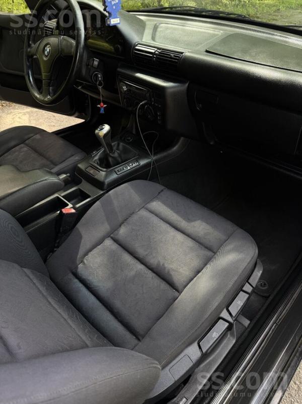 Melns BMW 318 1996 Bauska, ar dzinēja tilpumu 1.80 L un nobraukumu 340 tūkst. km par 2699 €, foto 10 vietnē AUTOMOTO.COM.LV