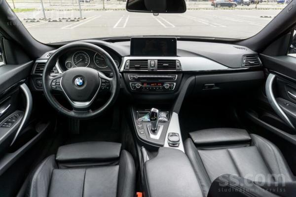Black BMW 318 2013 in Riga, with an engine capacity of 2.00 L and mileage of 288 thousand km for 14890 €, photo 11 on AUTOMOTO.COM.LV