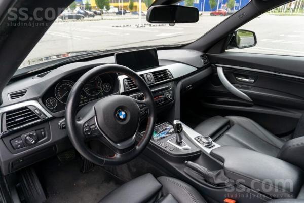 Black BMW 318 2013 in Riga, with an engine capacity of 2.00 L and mileage of 301 thousand km for 12890 €, photo 9 on AUTOMOTO.COM.LV