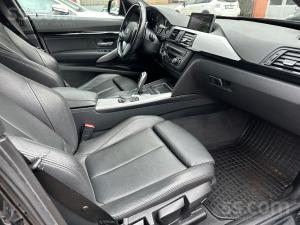 Black BMW 318 2016 in Riga, with an engine capacity of 2.00 L and mileage of 220 thousand km for 11800 €, photo 8 on AUTOMOTO.COM.LV