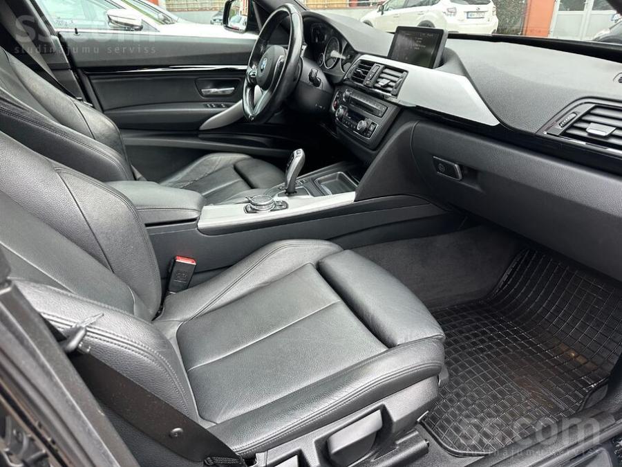 Black BMW 318 2016 in Riga, with an engine capacity of 2.00 L and mileage of 220 thousand km for 11800 €, photo 8 on AUTOMOTO.COM.LV