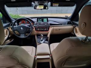 Black BMW 318 2017 in Riga, with an engine capacity of 2.00 L and mileage of 206 thousand km for 14590 €, photo 6 on AUTOMOTO.COM.LV