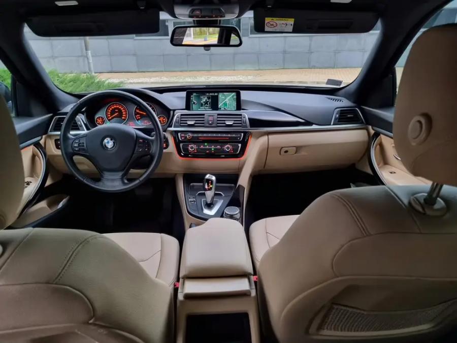 Black BMW 318 2017 in Riga, with an engine capacity of 2.00 L and mileage of 206 thousand km for 14590 €, photo 6 on AUTOMOTO.COM.LV