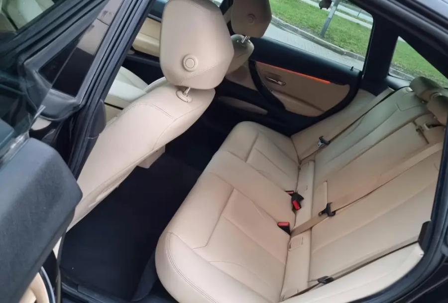Black BMW 318 2017 in Riga, with an engine capacity of 2.00 L and mileage of 206 thousand km for 14590 €, photo 9 on AUTOMOTO.COM.LV