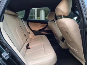 Black BMW 318 2017 in Riga, with an engine capacity of 2.00 L and mileage of 206 thousand km for 14590 €, photo 10 on AUTOMOTO.COM.LV