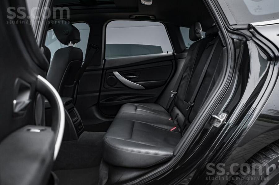 Black BMW 318 2020 in Riga, with an engine capacity of 2.00 L and mileage of 160 thousand km for 16990 €, photo 12 on AUTOMOTO.COM.LV