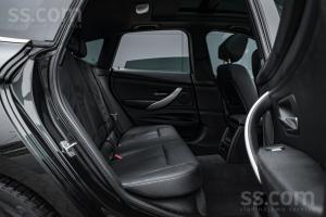 Black BMW 318 2020 in Riga, with an engine capacity of 2.00 L and mileage of 160 thousand km for 16990 €, photo 13 on AUTOMOTO.COM.LV