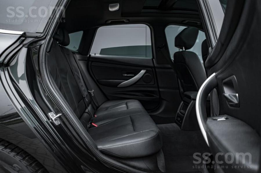 Black BMW 318 2020 in Riga, with an engine capacity of 2.00 L and mileage of 160 thousand km for 16990 €, photo 13 on AUTOMOTO.COM.LV