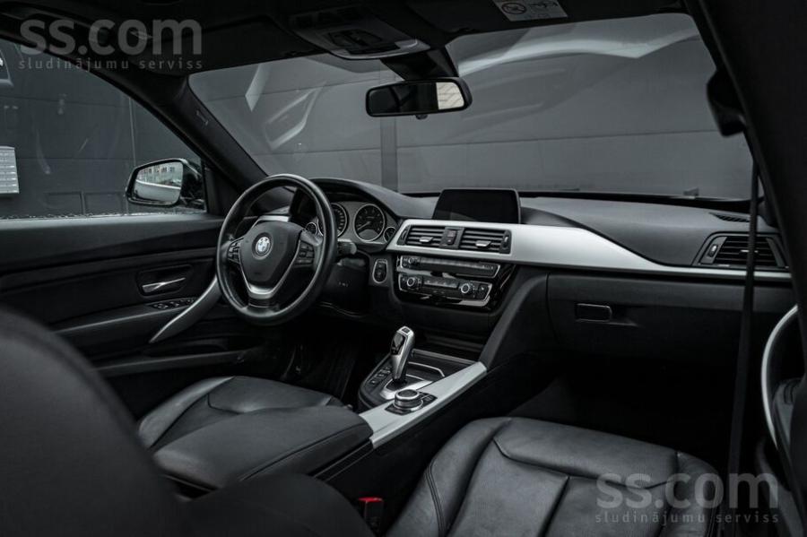 Black BMW 318 2020 in Riga, with an engine capacity of 2.00 L and mileage of 160 thousand km for 16990 €, photo 14 on AUTOMOTO.COM.LV