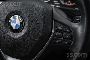 Black BMW 318 2020 in Riga, with an engine capacity of 2.00 L and mileage of 160 thousand km for 16990 €, photo 23 on AUTOMOTO.COM.LV