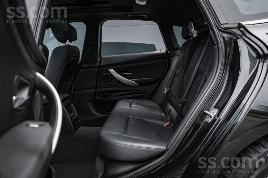 Black BMW 318 2020 in Riga, with an engine capacity of 2.00 L and mileage of 160 thousand km for 15990 €, photo 12 on AUTOMOTO.COM.LV