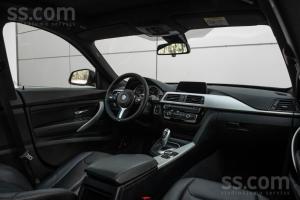 Black BMW 318 2020 in Riga, with an engine capacity of 2.00 L and mileage of 160 thousand km for 15990 €, photo 15 on AUTOMOTO.COM.LV
