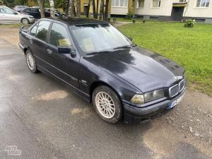 Black BMW 318 1995 in Klaipeda, with an engine capacity of 1.80 L and mileage of 240 thousand km for 1500 €, photo 7 on AUTOMOTO.COM.LV