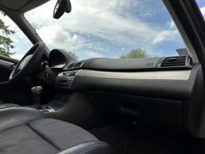 Black BMW 318 2003 in Riga, with an engine capacity of 2.00 L and mileage of 394 thousand km for 1690 €, photo 11 on AUTOMOTO.COM.LV