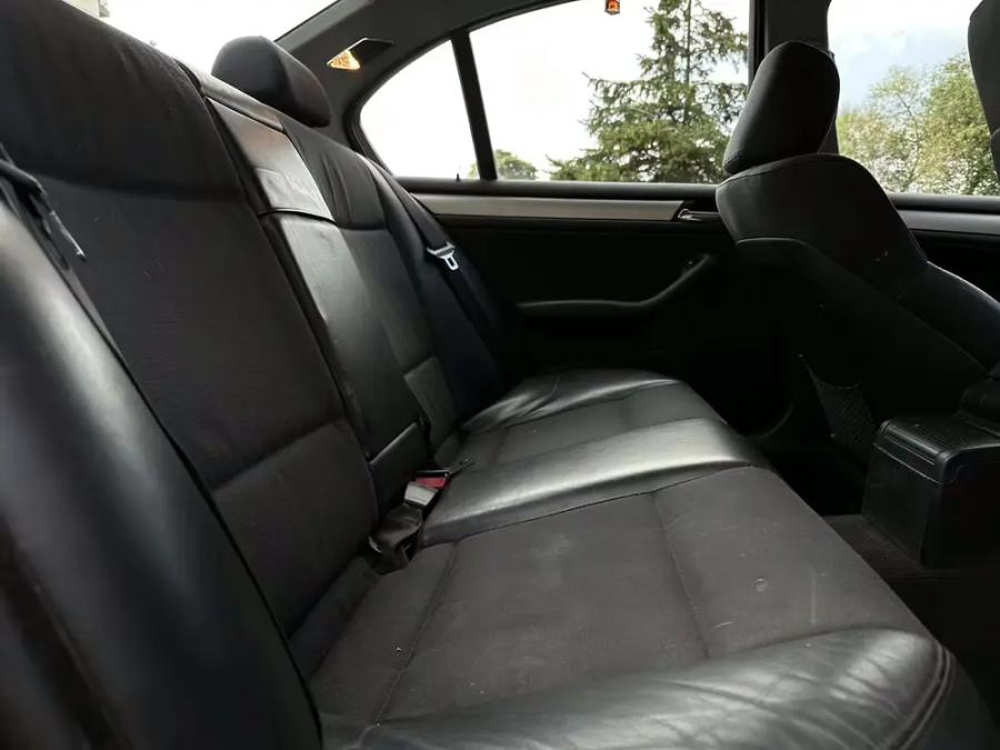 Black BMW 318 2003 in Riga, with an engine capacity of 2.00 L and mileage of 394 thousand km for 1690 €, photo 14 on AUTOMOTO.COM.LV