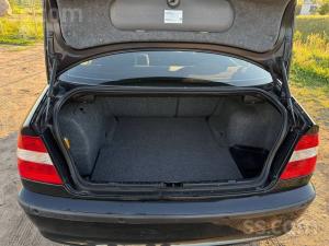 Black BMW 318 2003 in Daugavpils, with an engine capacity of 2.00 L and mileage of 303 thousand km for 2800 €, photo 8 on AUTOMOTO.COM.LV