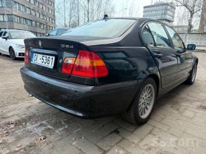 Black BMW 318 2004 in Riga, with an engine capacity of 2.00 L and mileage of 260 thousand km for 2600 €, photo 6 on AUTOMOTO.COM.LV