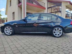 Black BMW 318 2006 in Marijampole, with an engine capacity of 2.00 L and mileage of 181 thousand km for 3799 €, photo 5 on AUTOMOTO.COM.LV