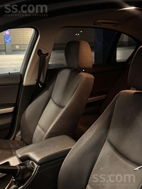 Black BMW 318 2007 in Riga, with an engine capacity of 2.00 L and mileage of 277 thousand km for 2000 €, photo 7 on AUTOMOTO.COM.LV