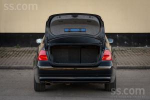 Black BMW 318 2009 in Talsi, with an engine capacity of 2.00 L and mileage of 294 thousand km for 5390 €, photo 7 on AUTOMOTO.COM.LV