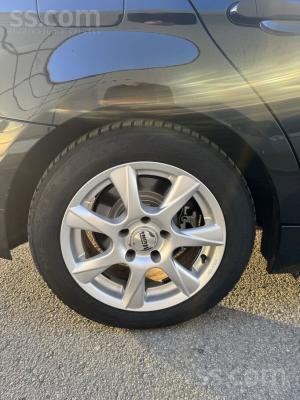 Black BMW 318 2009 in Riga, with an engine capacity of 2.00 L and mileage of 289 thousand km for 4150 €, photo 8 on AUTOMOTO.COM.LV